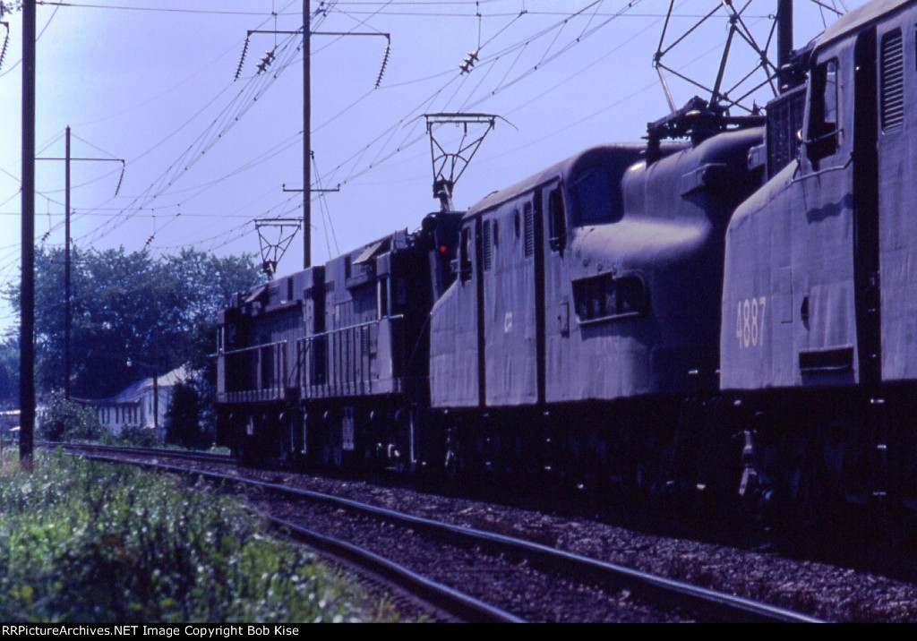 Rare E44-GG1 lashup under threatening skies